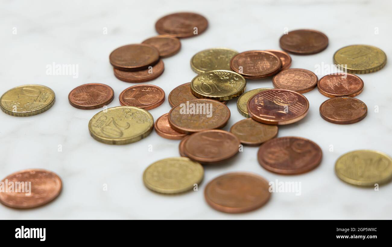 Pile of different cents coins in bright light Stock Photo - Alamy