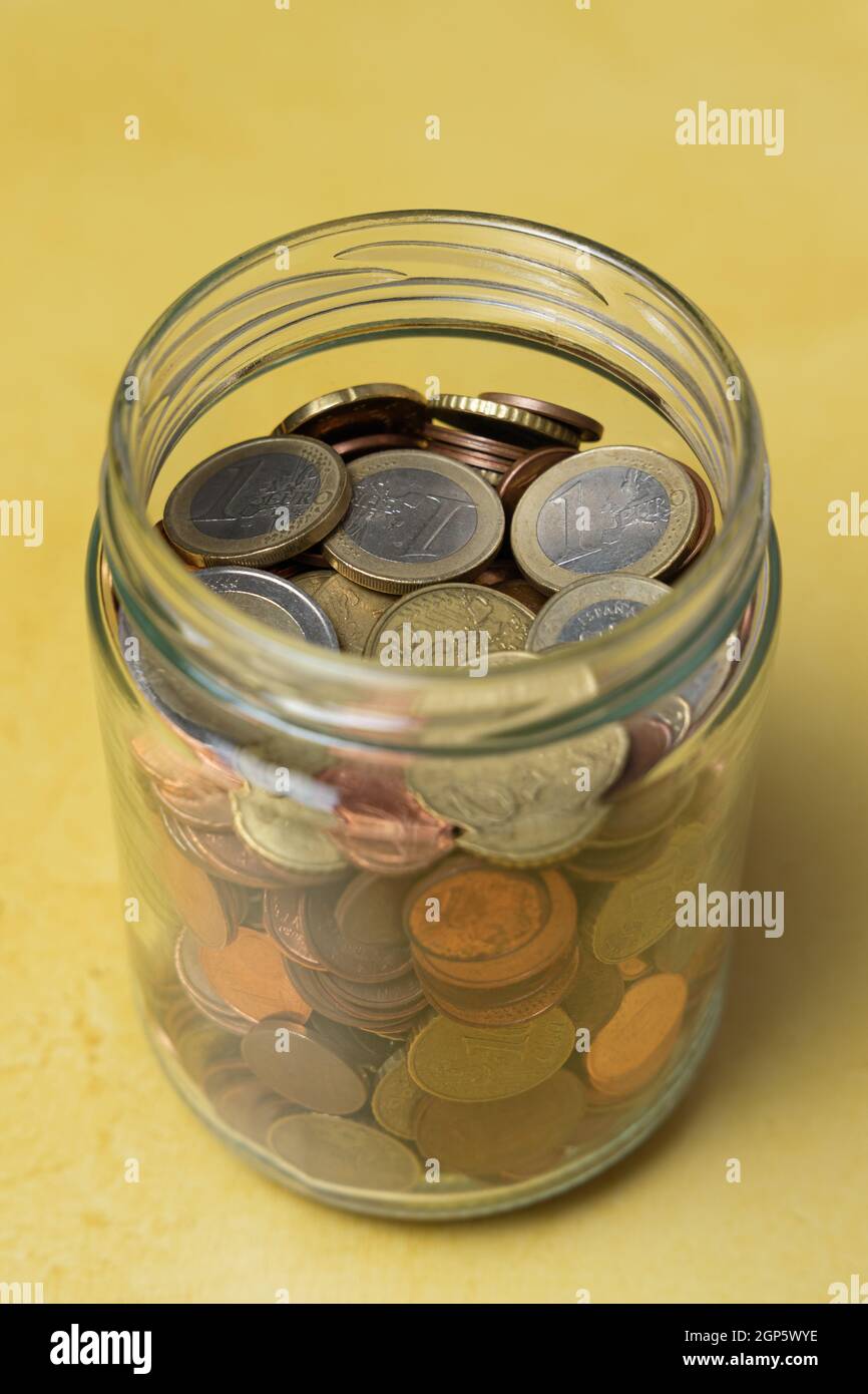 Money saving pot hi-res stock photography and images - Alamy