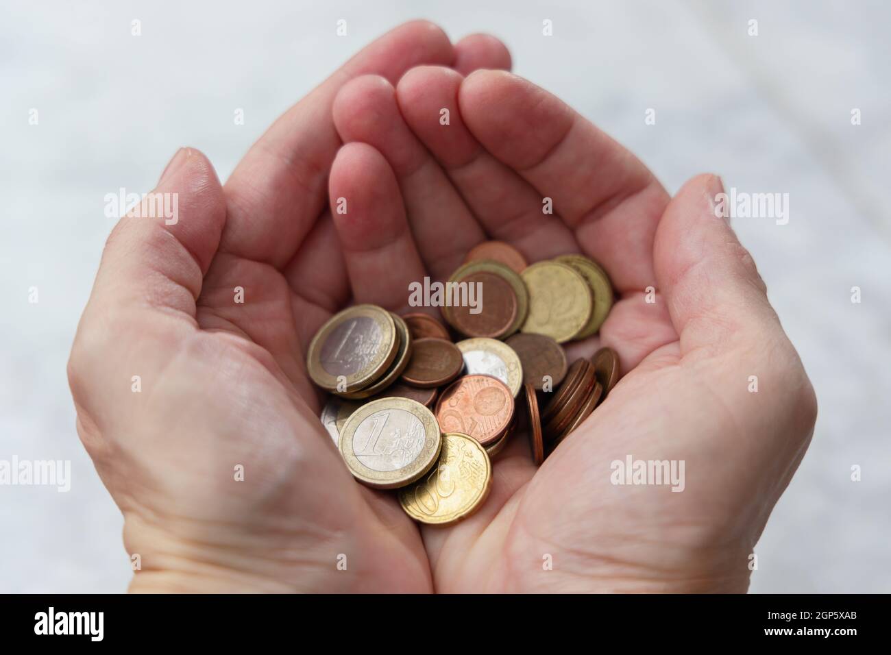 Charity money hands hi-res stock photography and images - Alamy