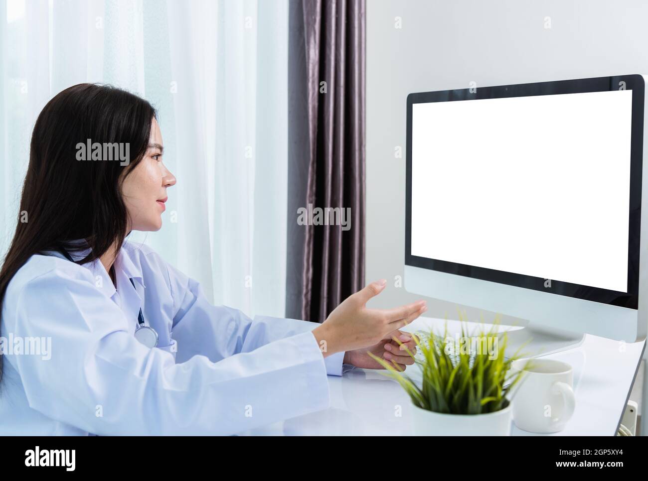 Asian young beautiful woman doctor video call conference online raise ...