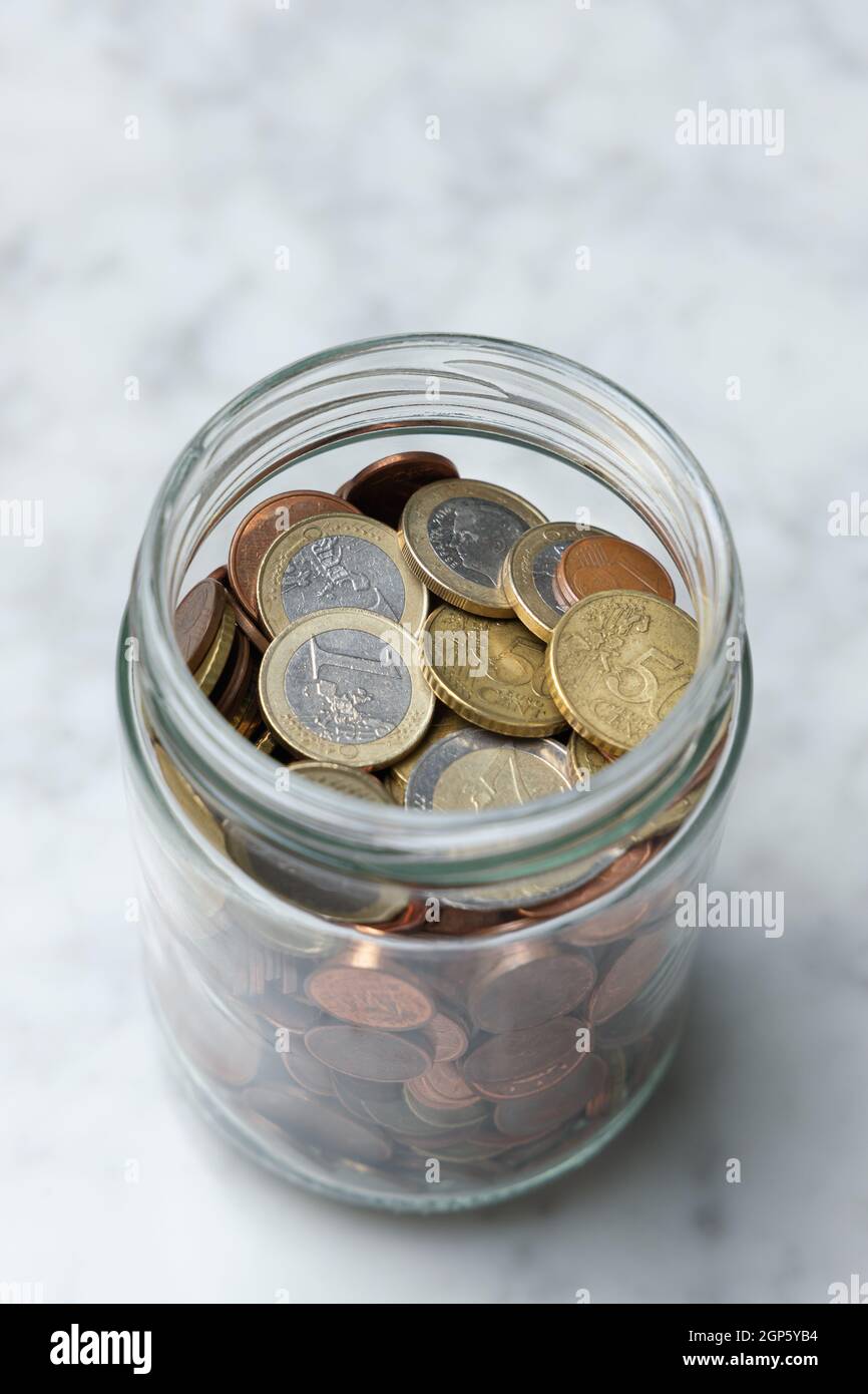 Money saving pot hi-res stock photography and images - Alamy