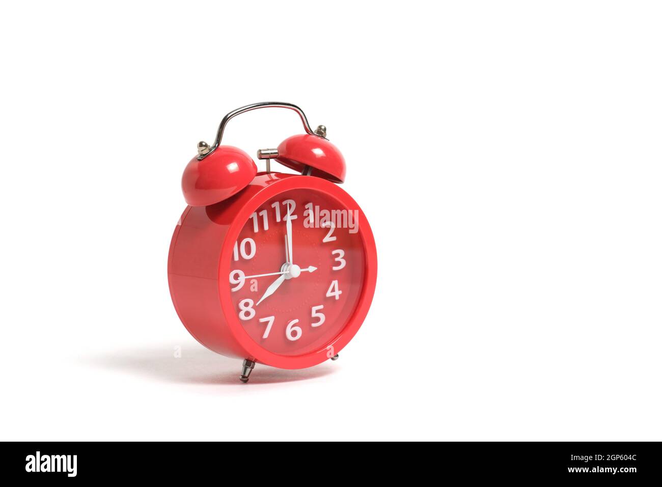 Ringing red alarm clock, isolate on white background, eight morning or ...