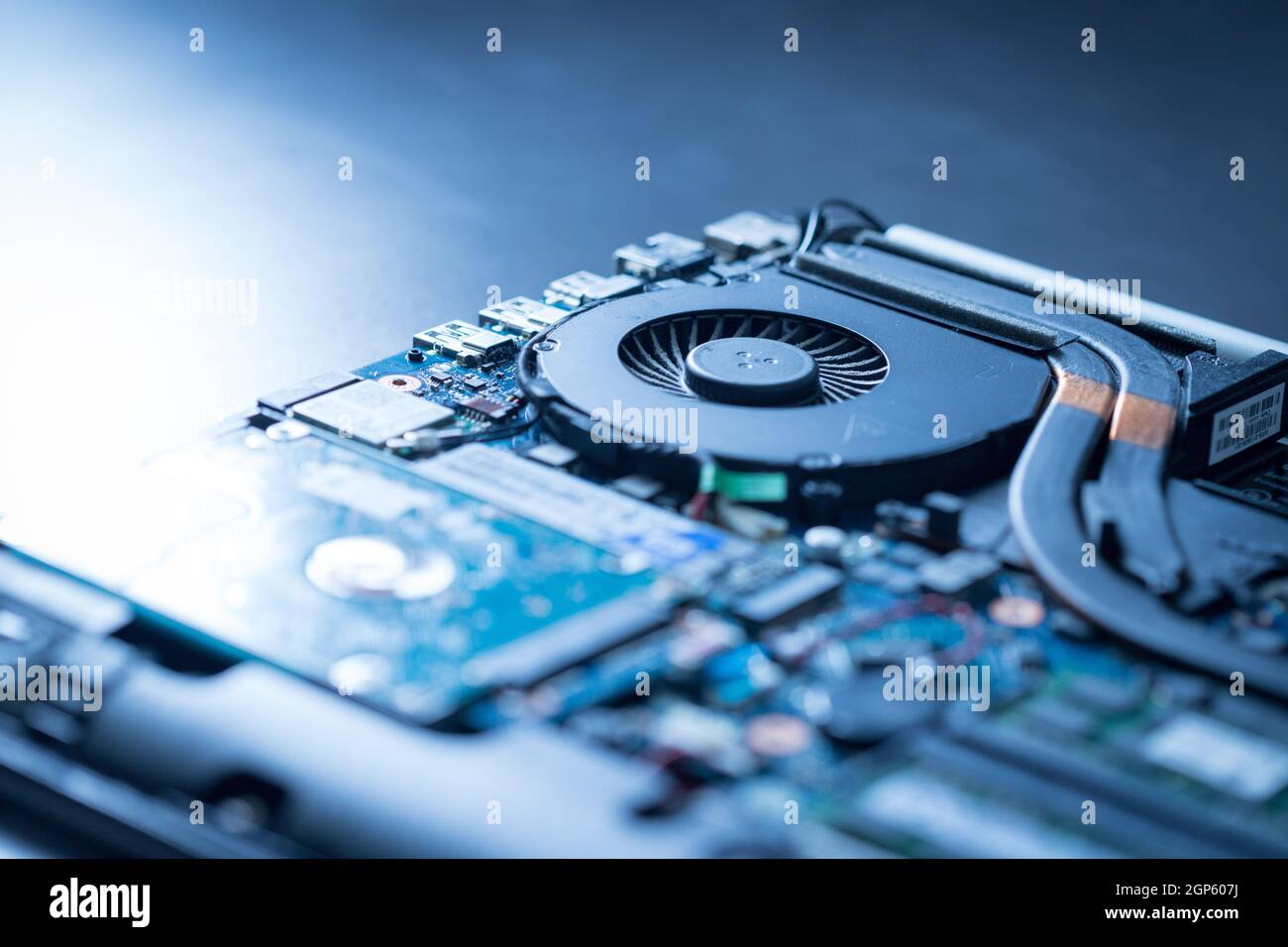 Computer cooling fan for overclocking on a circuit board, close up ...