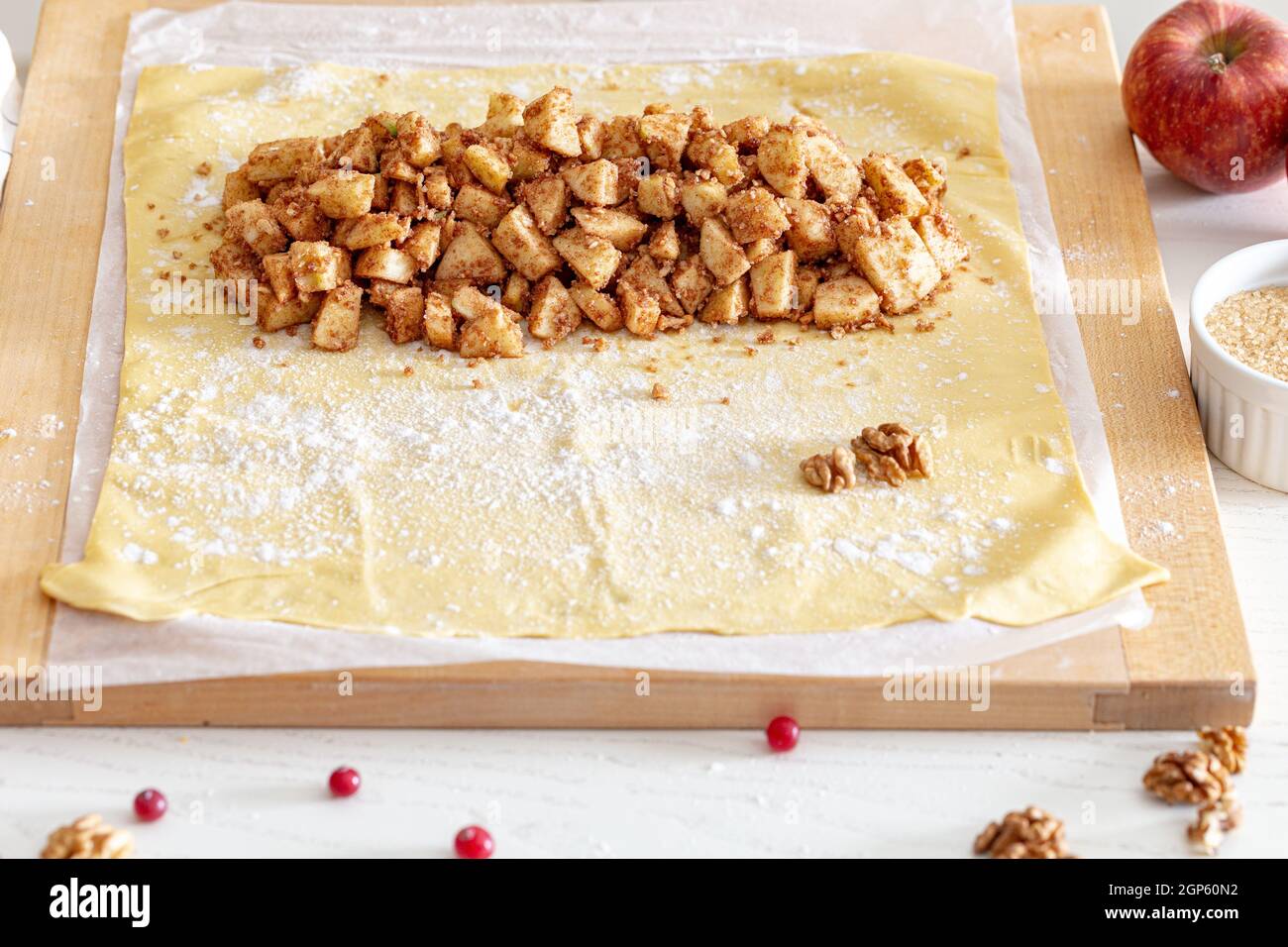 making strudel - dough, apples, cinnamon, nuts, brown sugar. process ...