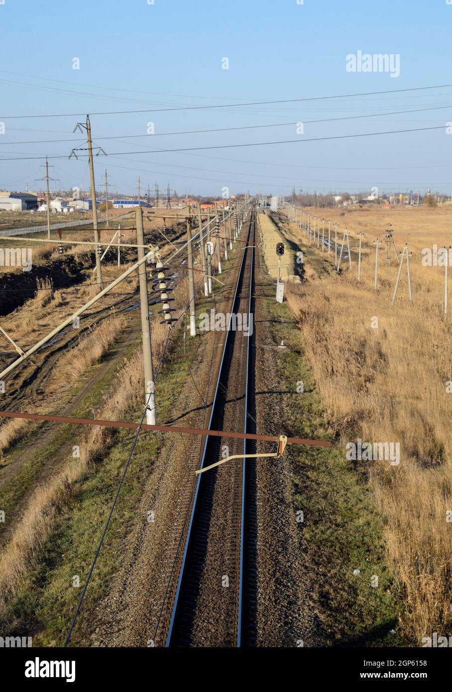 Plot railway. Top view on the rails. High-voltage power lines for ...