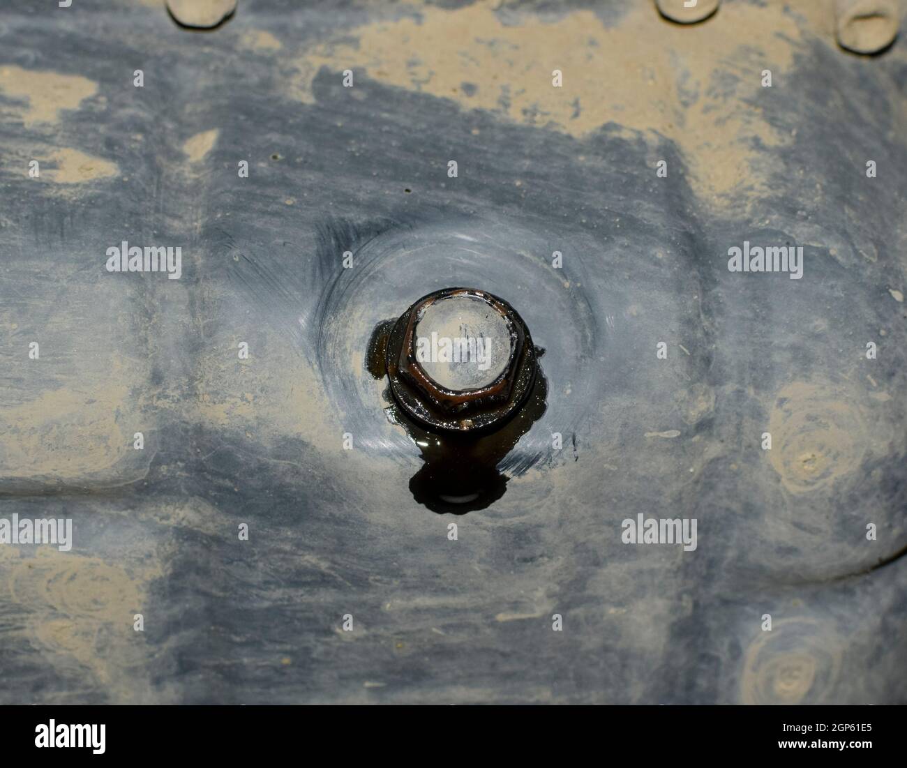 Drain the old oil from the engine through the drain plug. Changing the ...