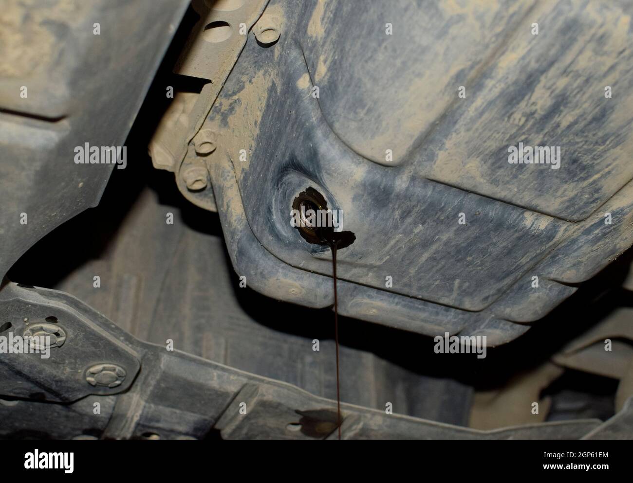 Drain the old oil from the engine through the drain plug. Changing the ...