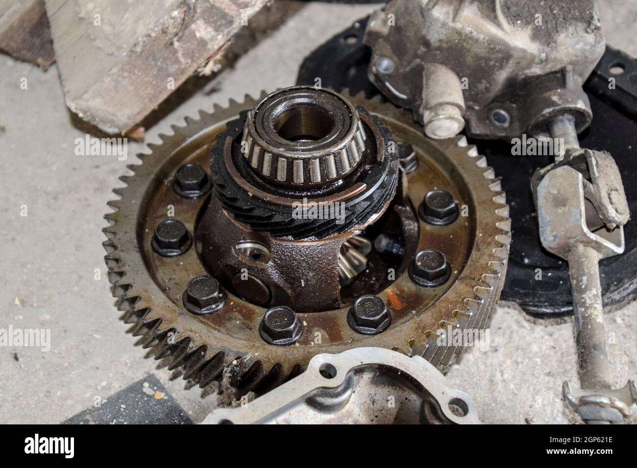 Dismantled box car transmissions. The gears on the shaft of a ...