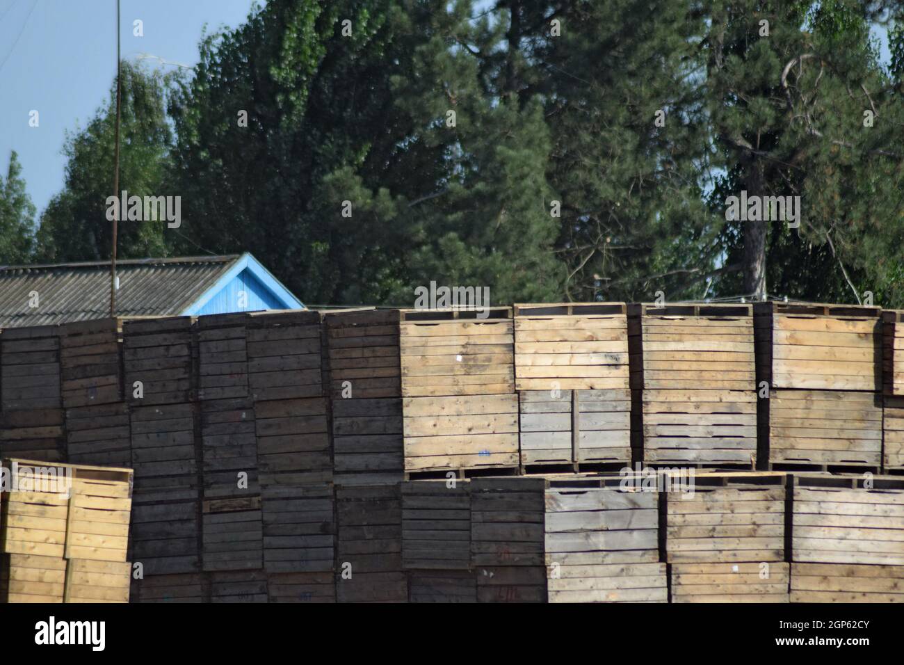 Wooden boxes stacked together. Warehouse empty wooden containers Stock ...