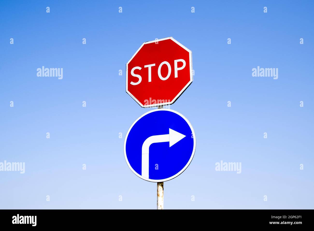 The road sign is stop. sign turn right Stock Photo - Alamy