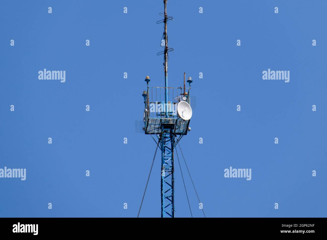 Communication tower with repeaters and satellite dish Stock Photo - Alamy