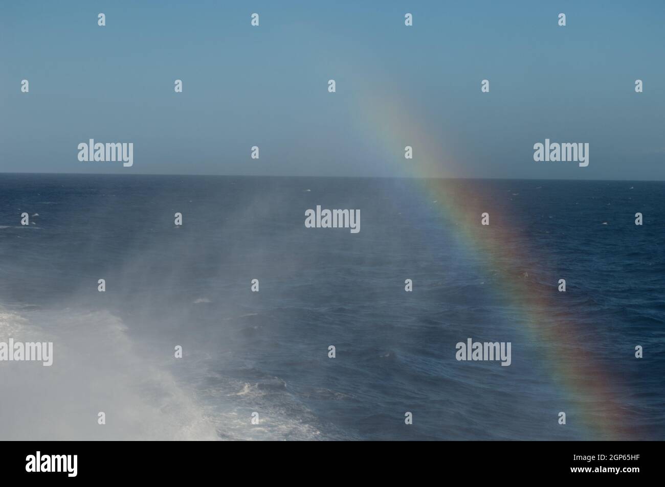 Wake and rainbow left by a ship. Atlantic Ocean. Canary Islands. Spain ...