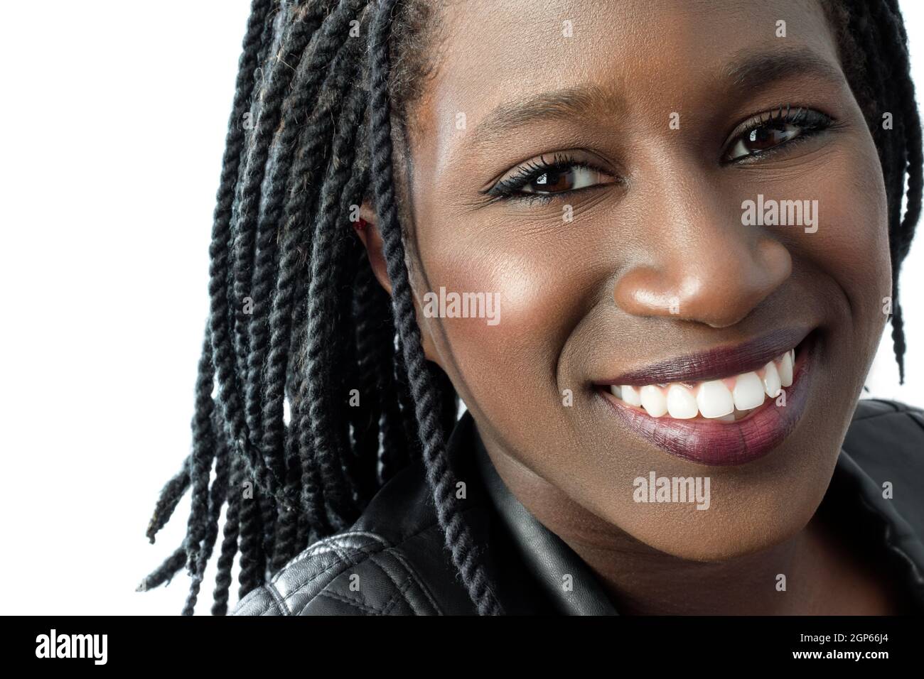 Macro close up face shot of attractive young african woman with ...