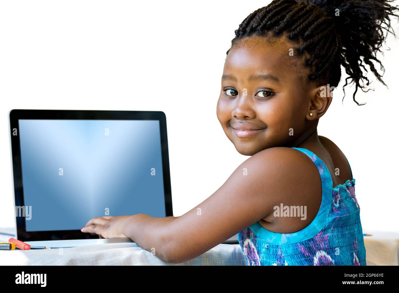 Close up portrait of little african girl typing on laptop.Isolated on ...