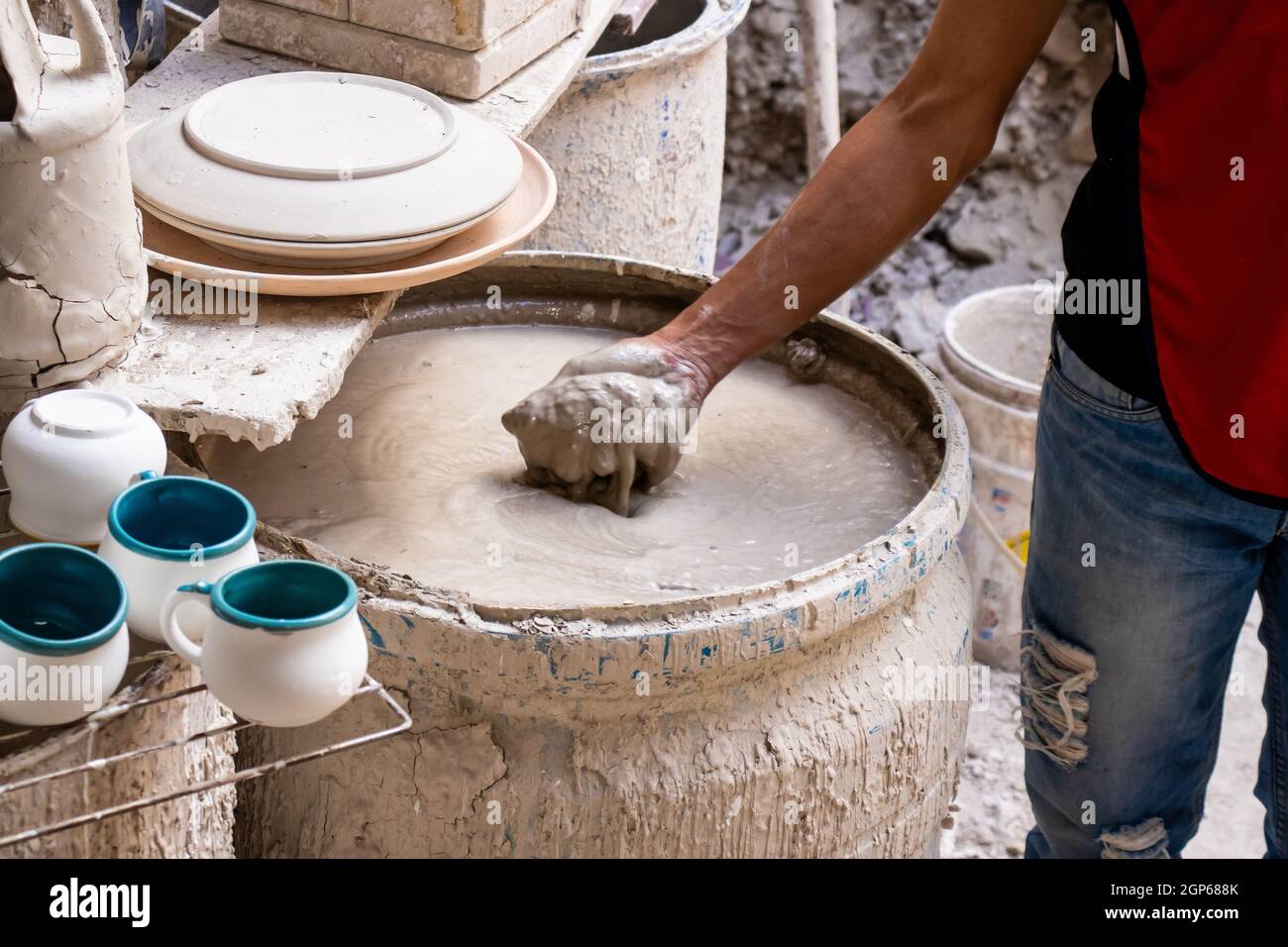 Barrel filled with mix for the clay injection molding technique in a ...