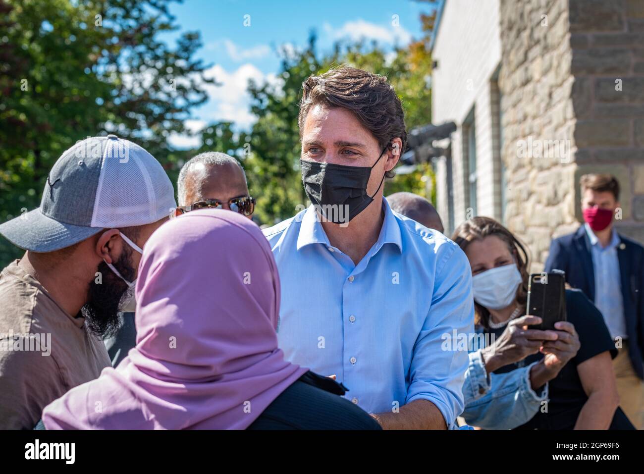Prime Minister Justin Trudeau greets bystanders after a press ...