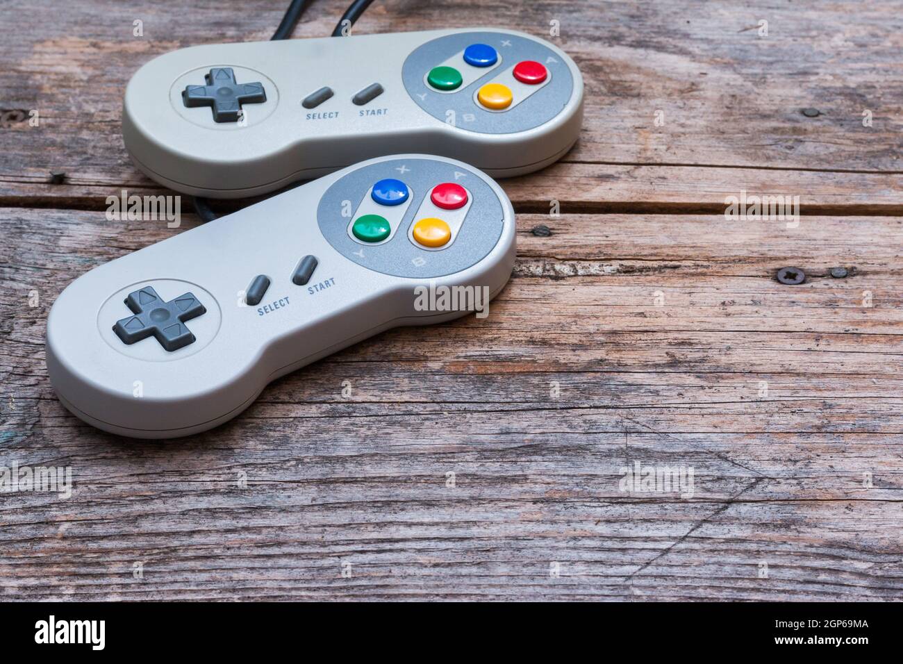 Retro computer gaming controller a rustic wooden background Stock Photo ...