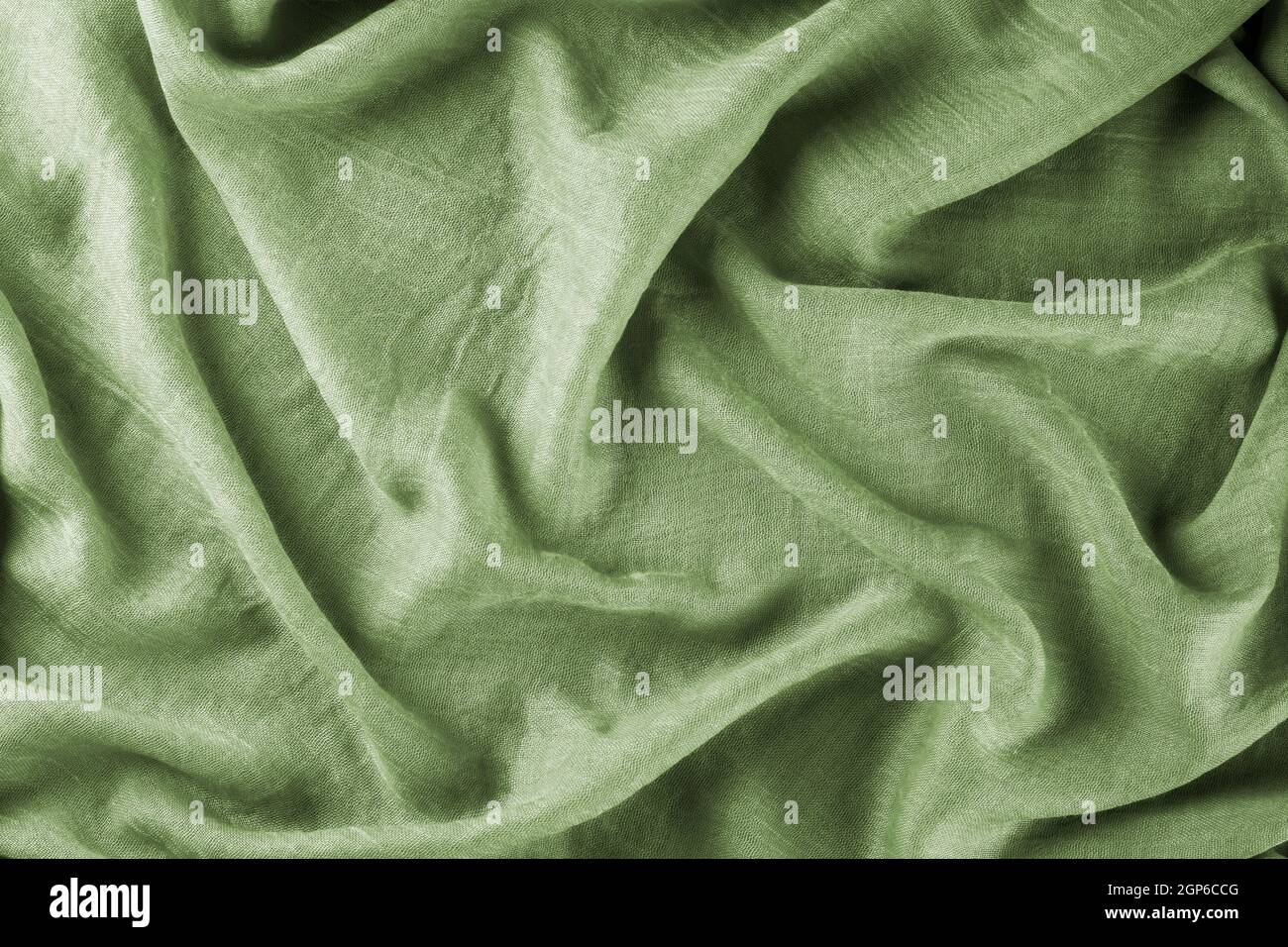 Green draped lightweight fabric Stock Photo - Alamy
