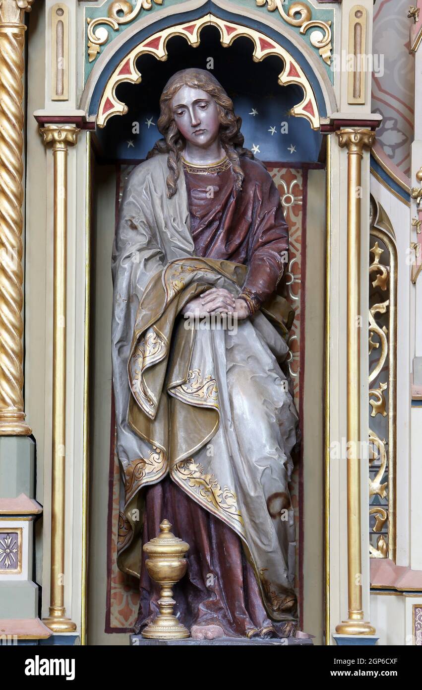 Saint Mary Magdalene statue on the Sacred heart of Jesus altar in the ...