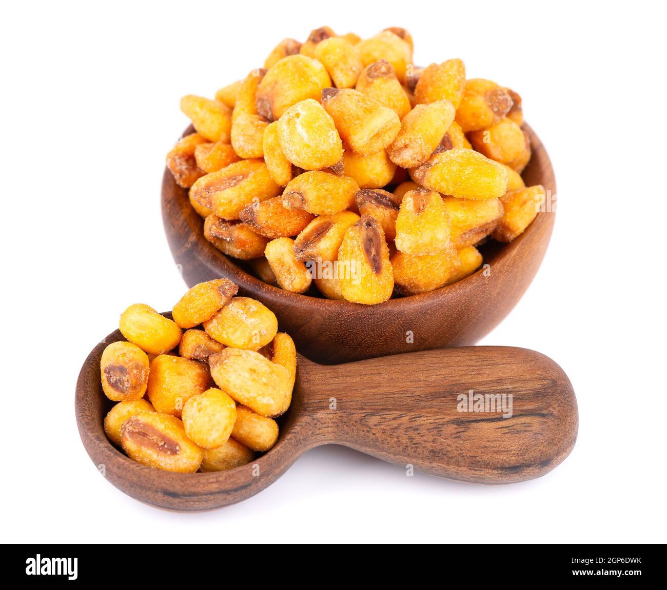 Roasted salted corn nuts in wooden bowl and spoon, isolated on white ...