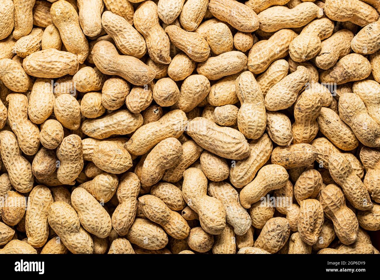Dried peanuts. Tasty groundnuts. Texture. Top view Stock Photo - Alamy