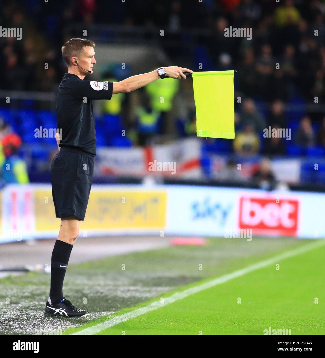 The assistant referee flags for an offside hi-res stock photography and ...