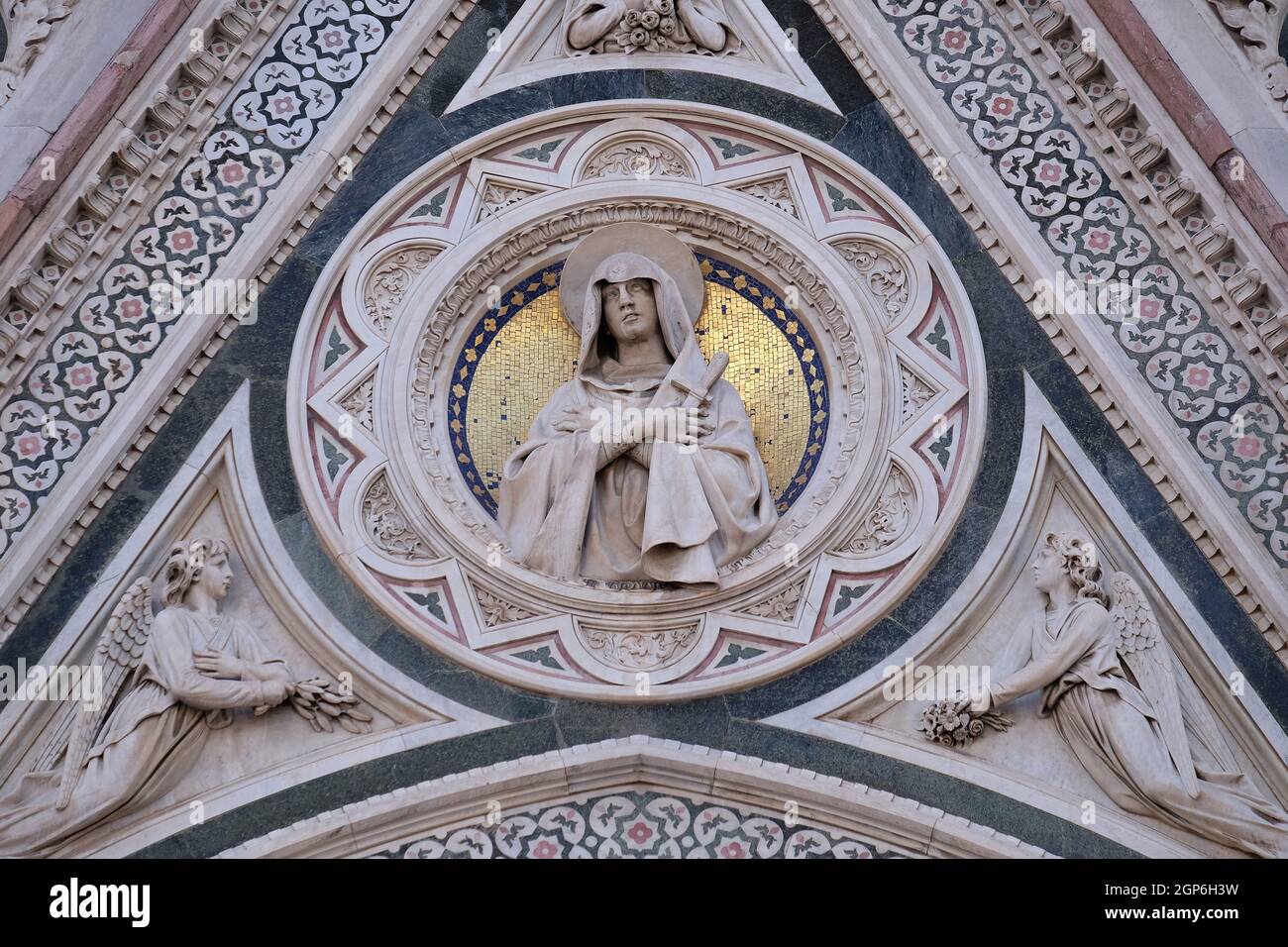 Our Lady of Sorrows supported by Angels bearing Flowers, Portal of ...