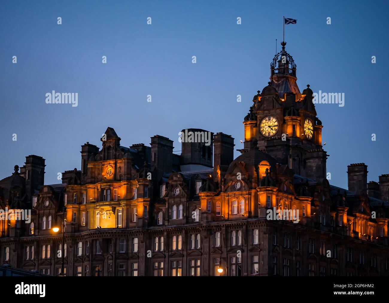 Victorian building, Rocco Forte Balmoral Hotel clock tower lit up at ...