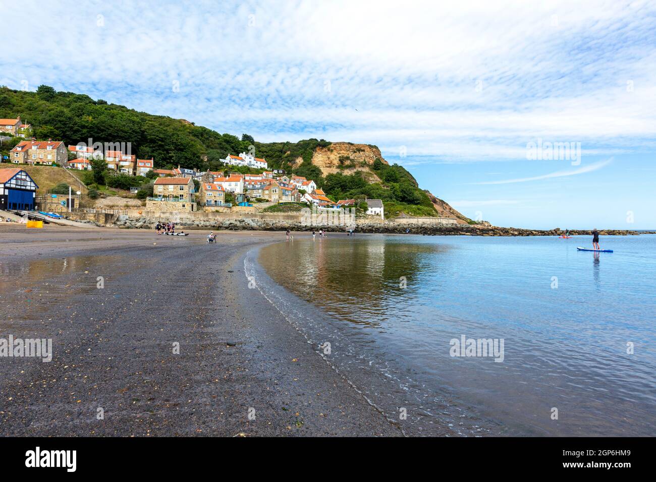 Paddleboarding in Runswick Bay, Yorkshire and the Humber, England, UK ...