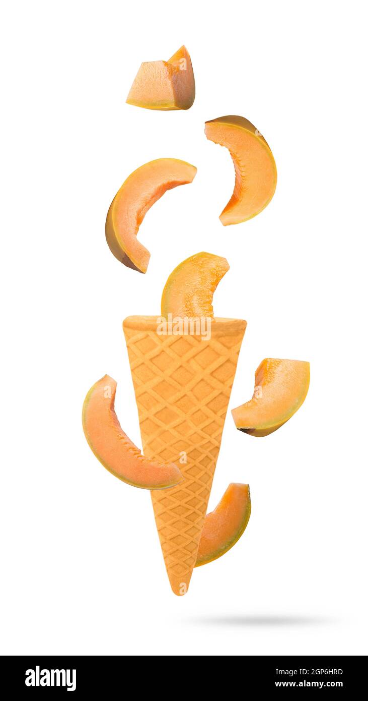 Isolated flying fruit. Seven slices of yellow melon fruits falling down ...