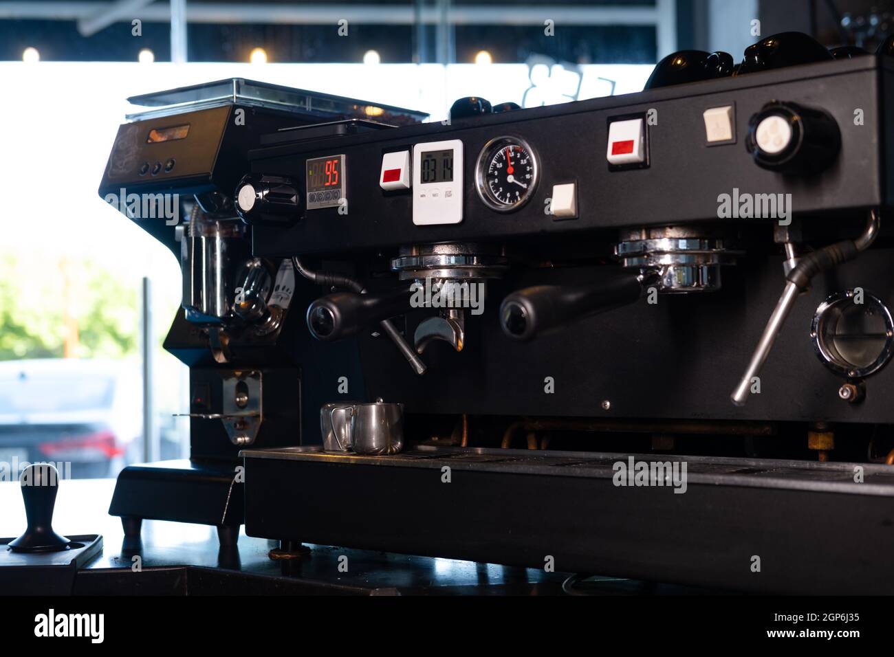 details of dark loft coffee shop. professional coffee machine close up ...