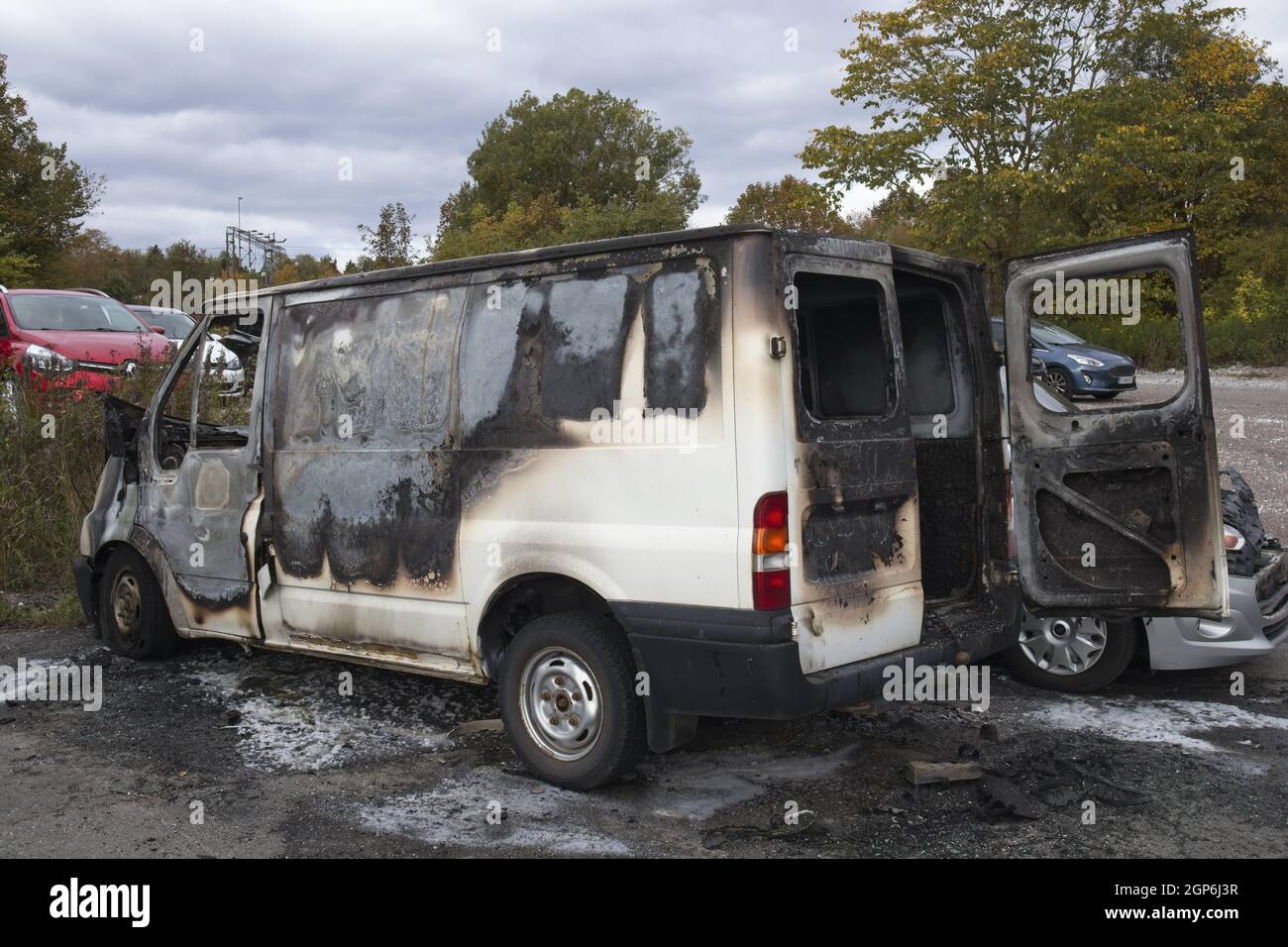 Horizontal shot of Remains of a white burnt van outdoors Stock Photo ...