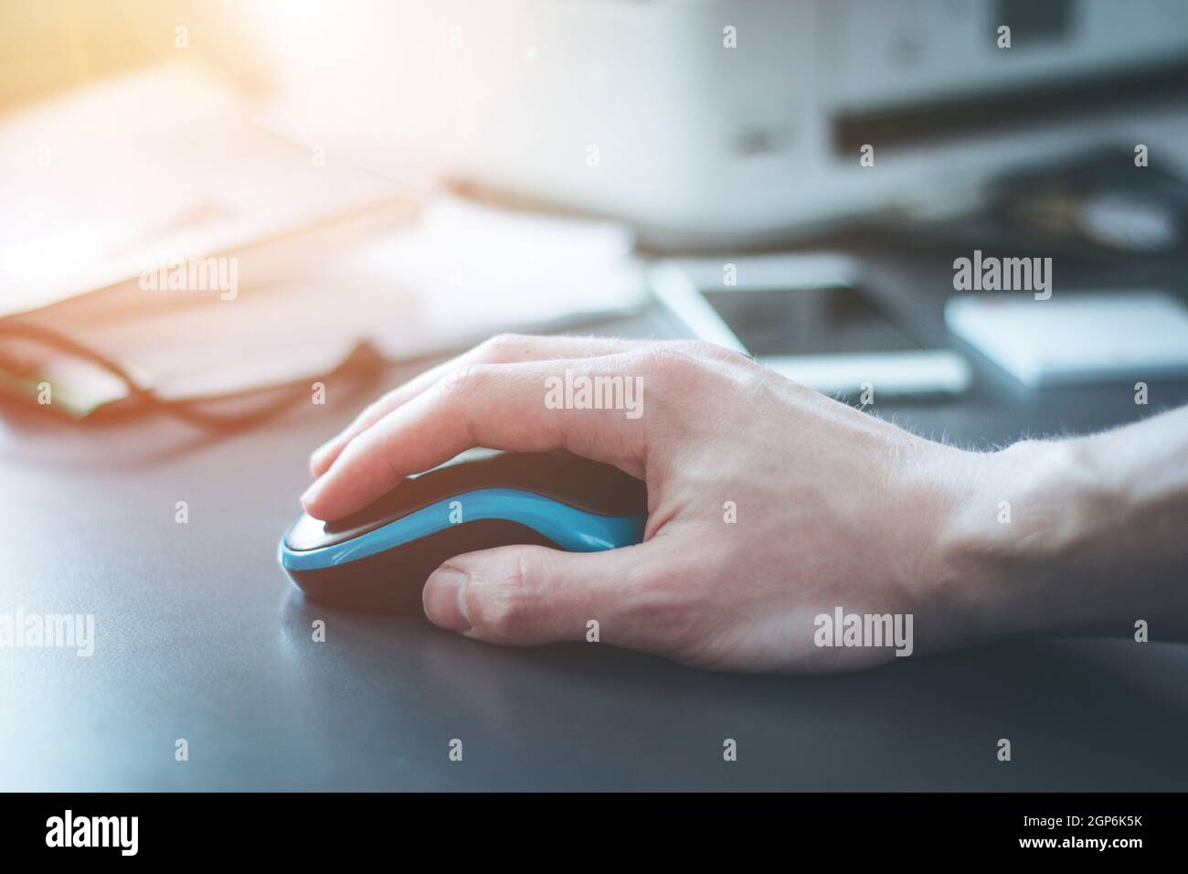 Close up of computer mouse used by a male hand Stock Photo - Alamy