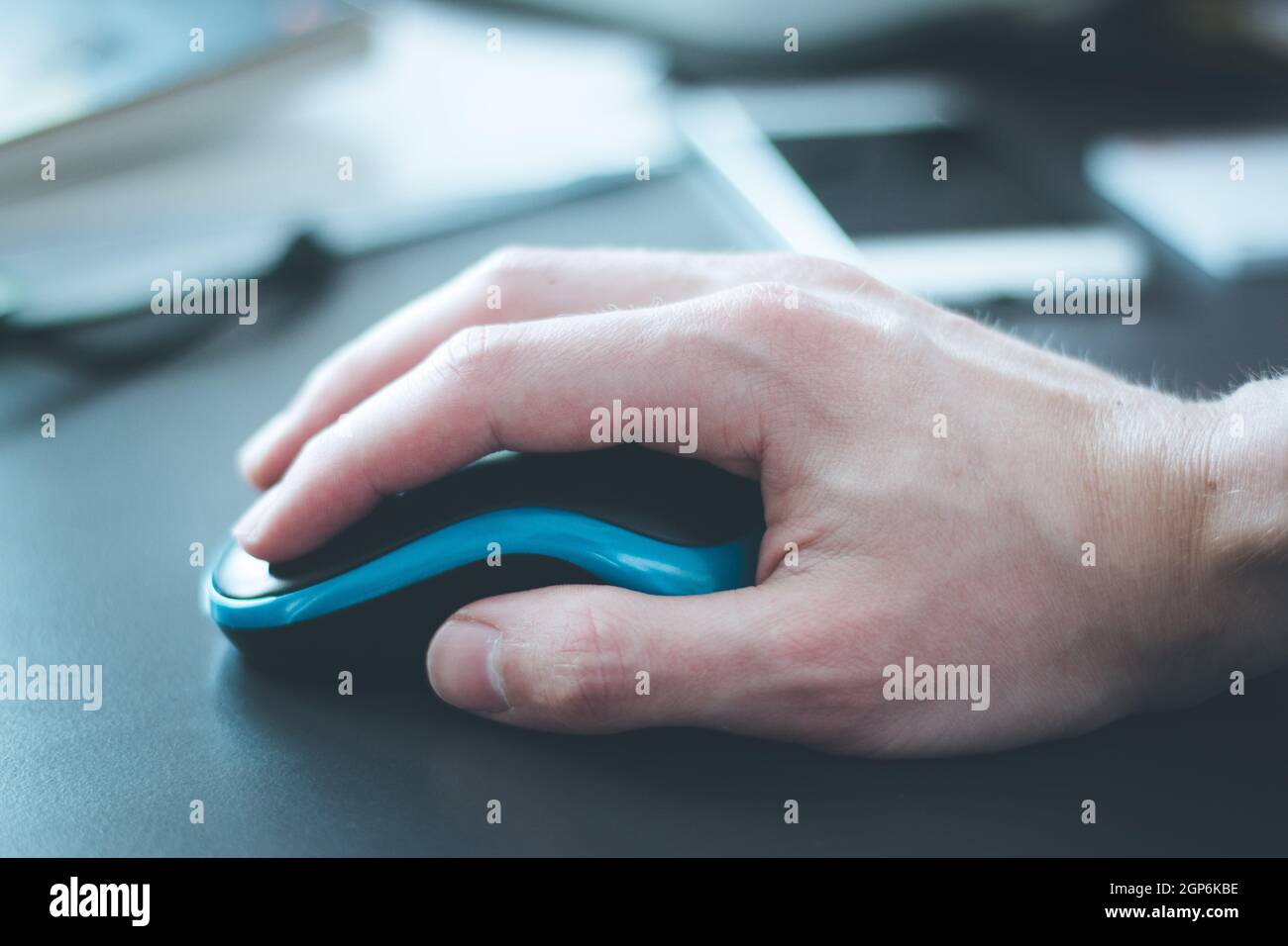 Close up of computer mouse used by a male hand Stock Photo - Alamy
