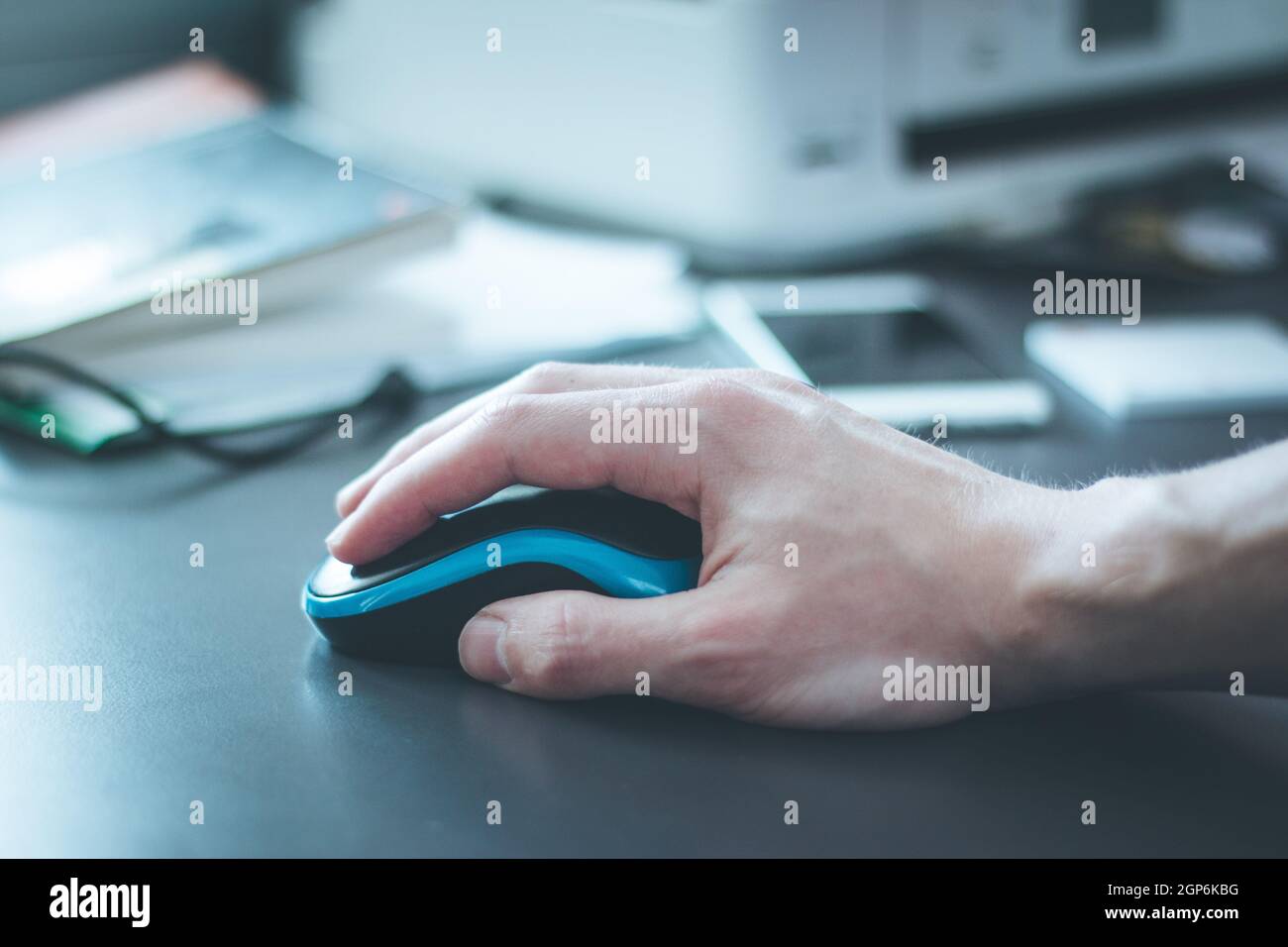 Close up of computer mouse used by a male hand Stock Photo - Alamy