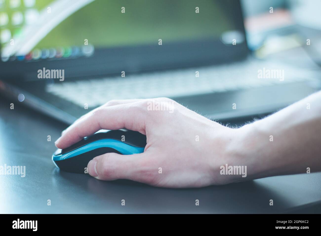 Close up of computer mouse used by a male hand Stock Photo - Alamy
