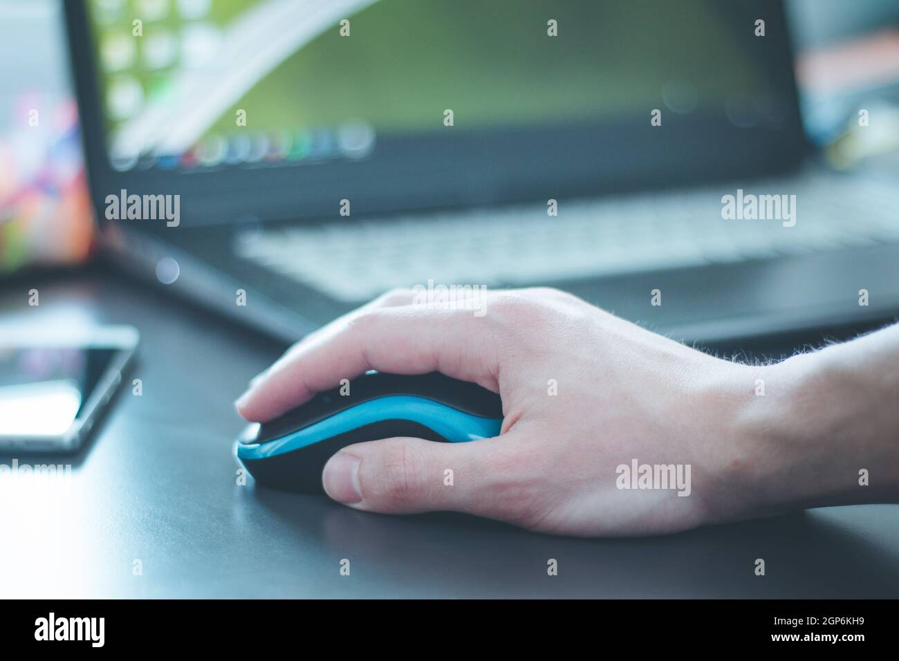 Close up of computer mouse used by a male hand Stock Photo - Alamy