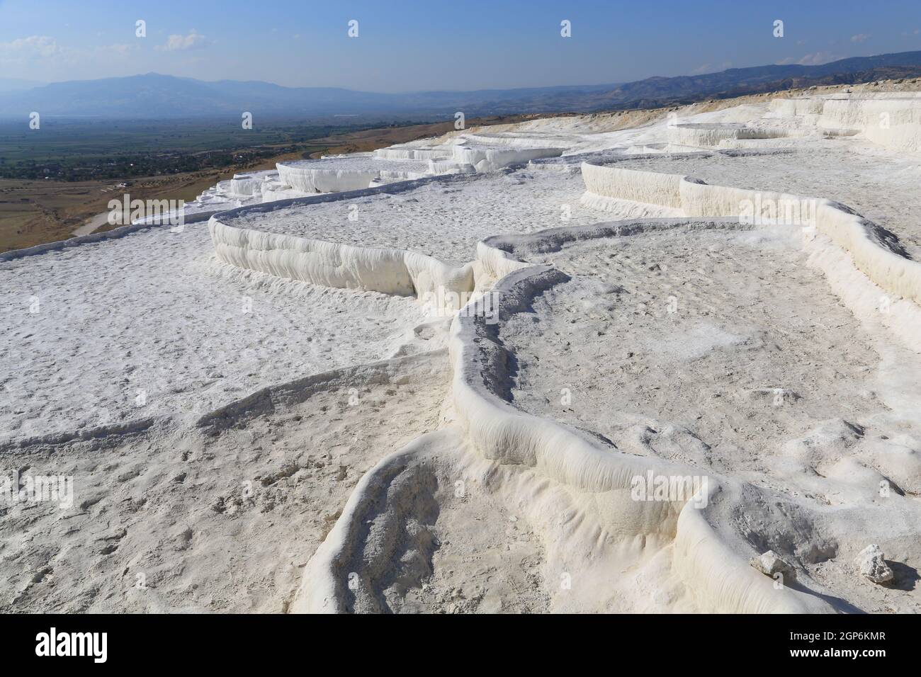The travertines of Pamukkale are a series of cascading thermal pools ...