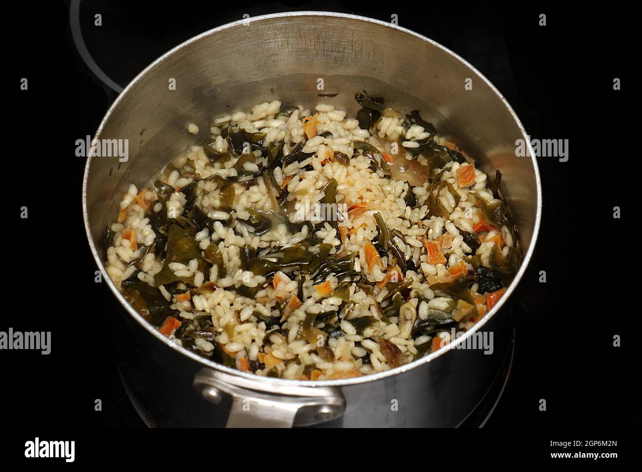 Risotto cooking in open hi-res stock photography and images - Alamy