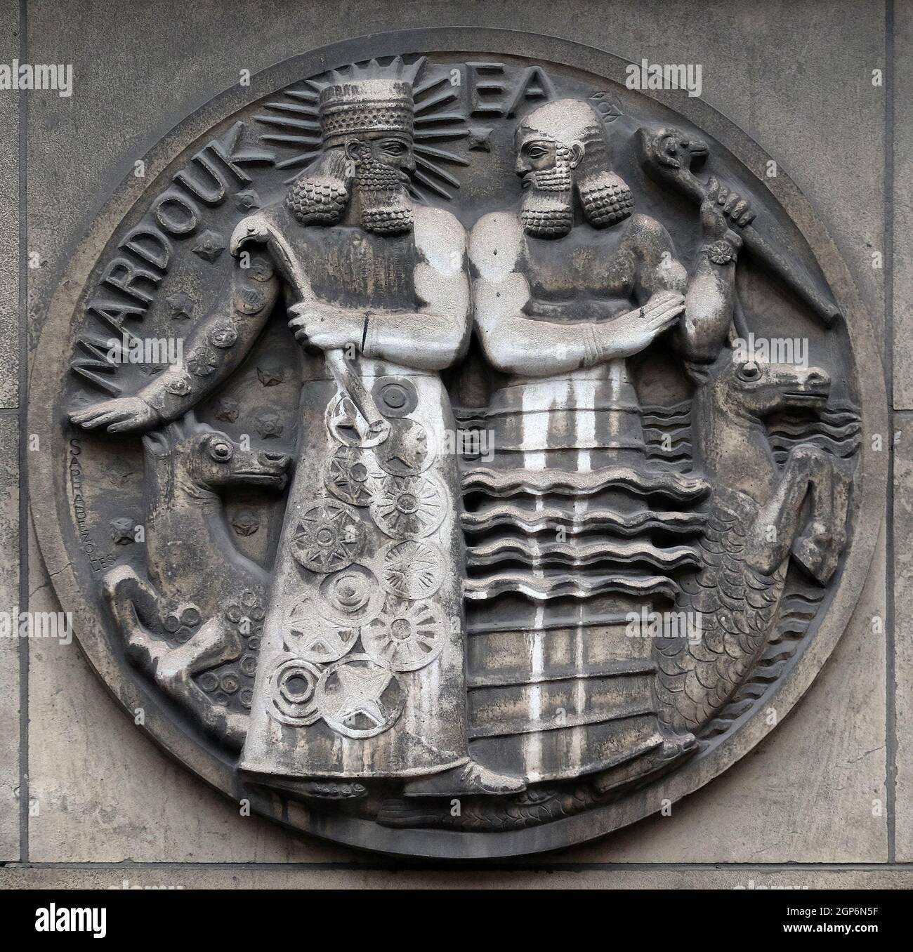 Marduk and Ea. Stone relief at the building of the Faculte de Medicine ...