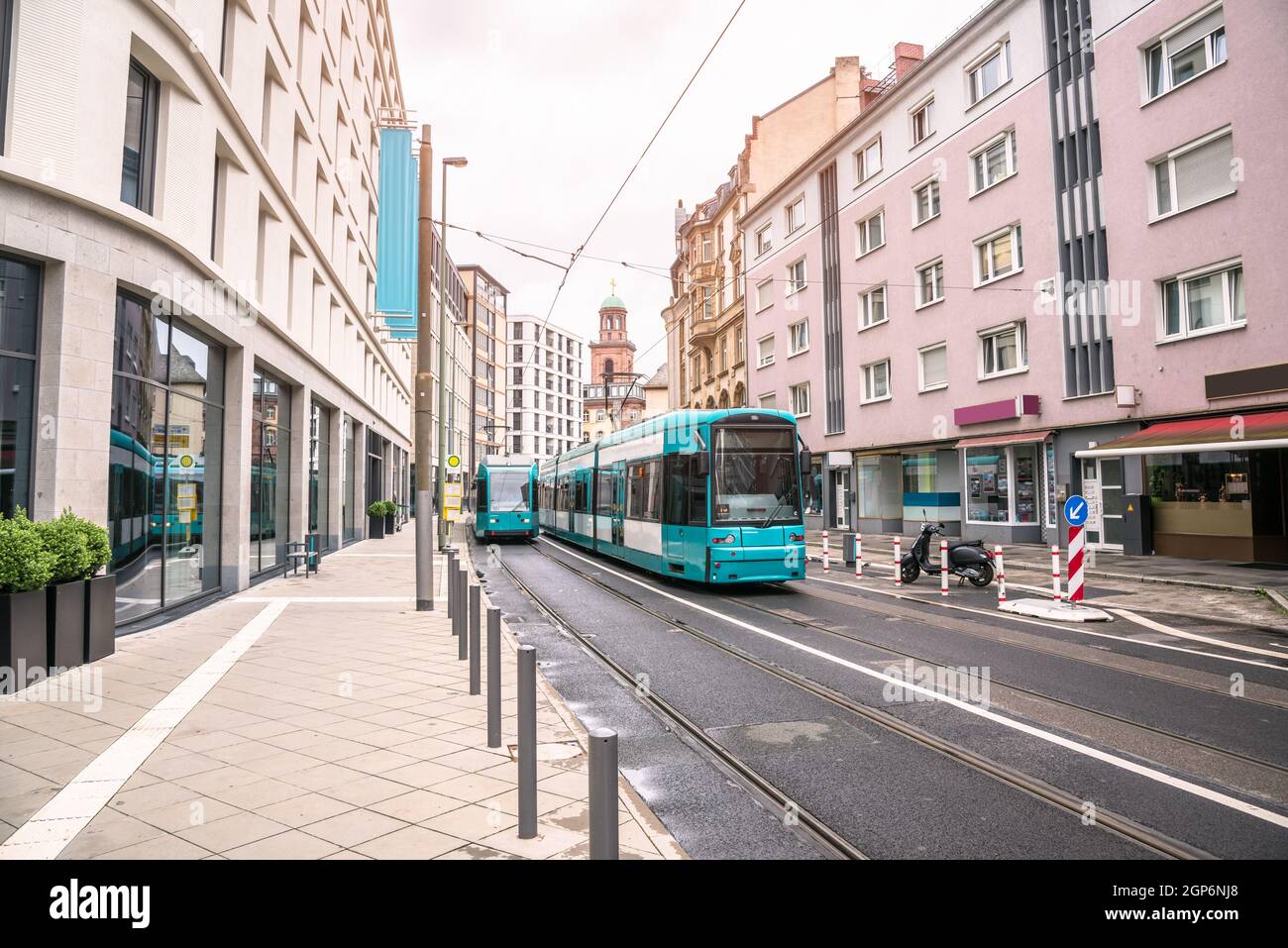 Trams running along a street in a city centre Stock Photo - Alamy