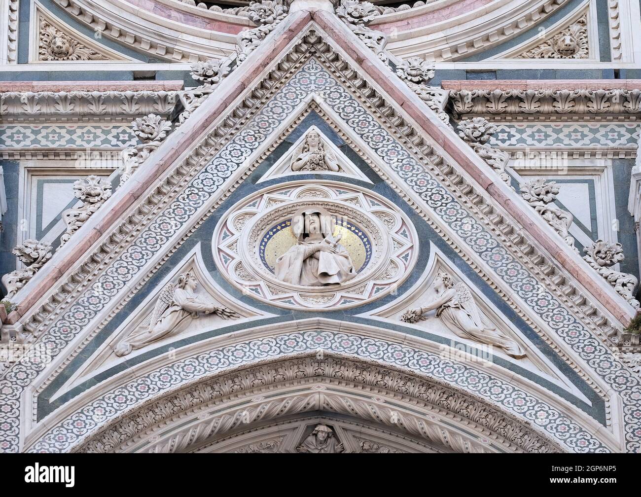 Our Lady of Sorrows supported by Angels bearing Flowers, Portal of ...