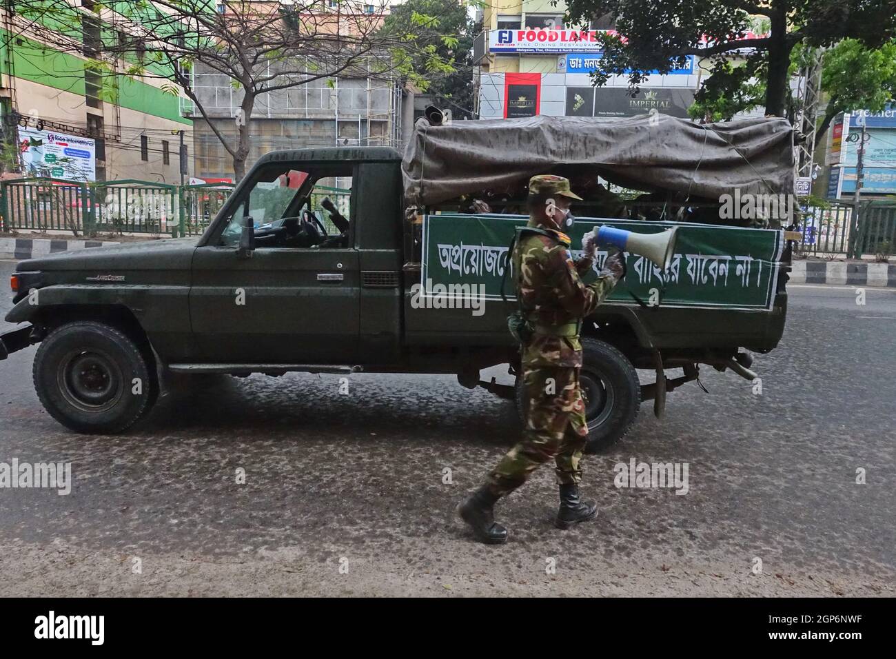 An army soldier announcing lockdown procedures. The country has had ...