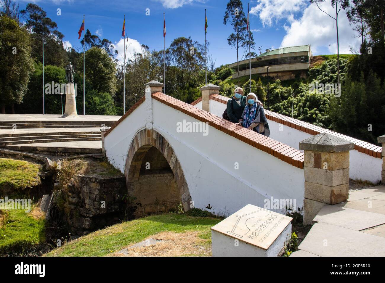 Senior mother and adult daughter traveling. The famous historic Bridge ...