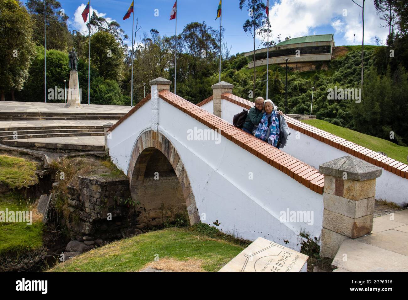 Senior mother and adult daughter traveling. The famous historic Bridge ...