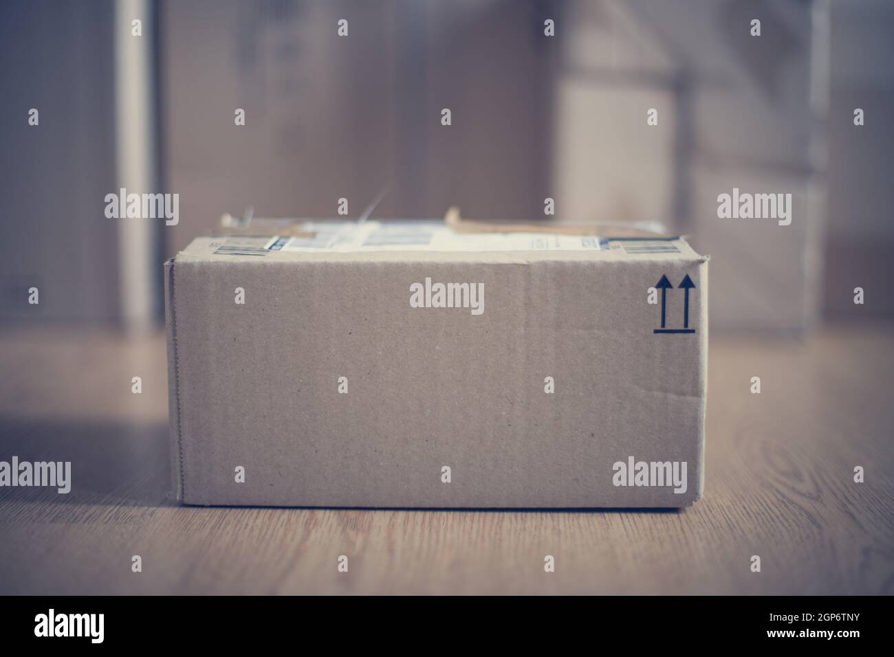 Cardboard box shipping concept: brown parcel Stock Photo - Alamy