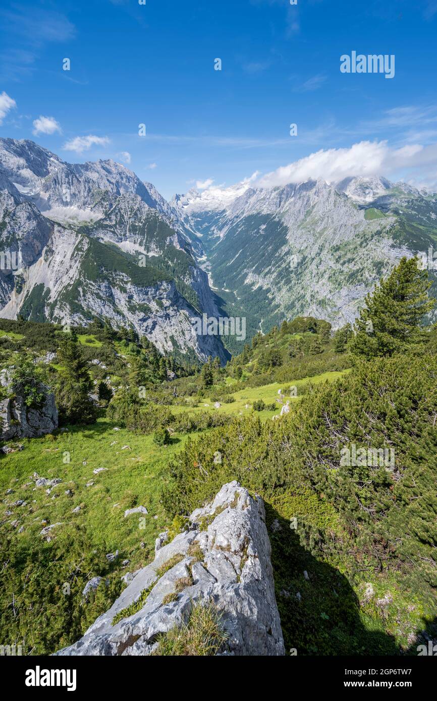 View into the Reintal valley, behind summit of the Zugspitze and ...