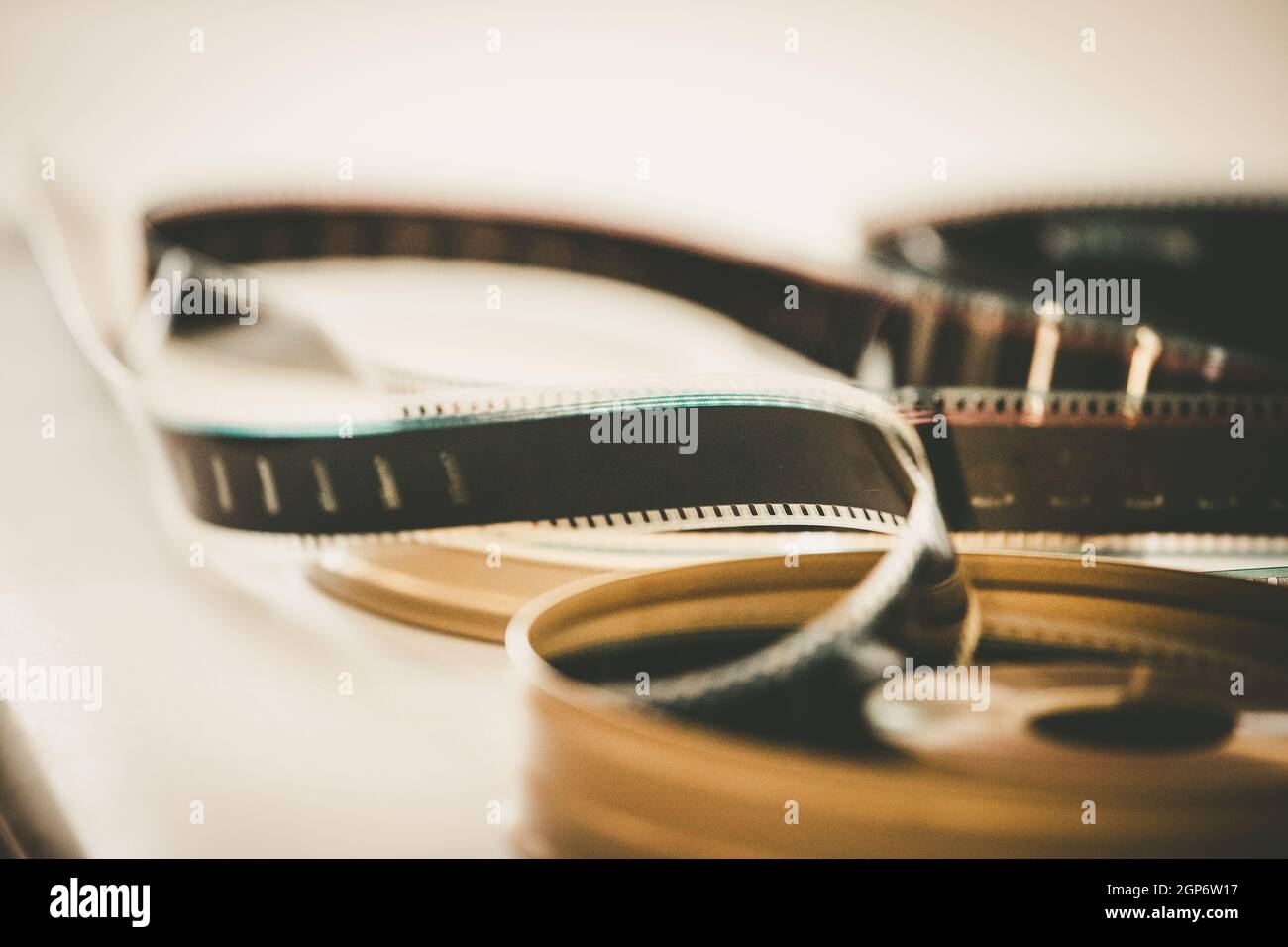 Filmstrip or film reel on a cutting table, vintage film production in ...