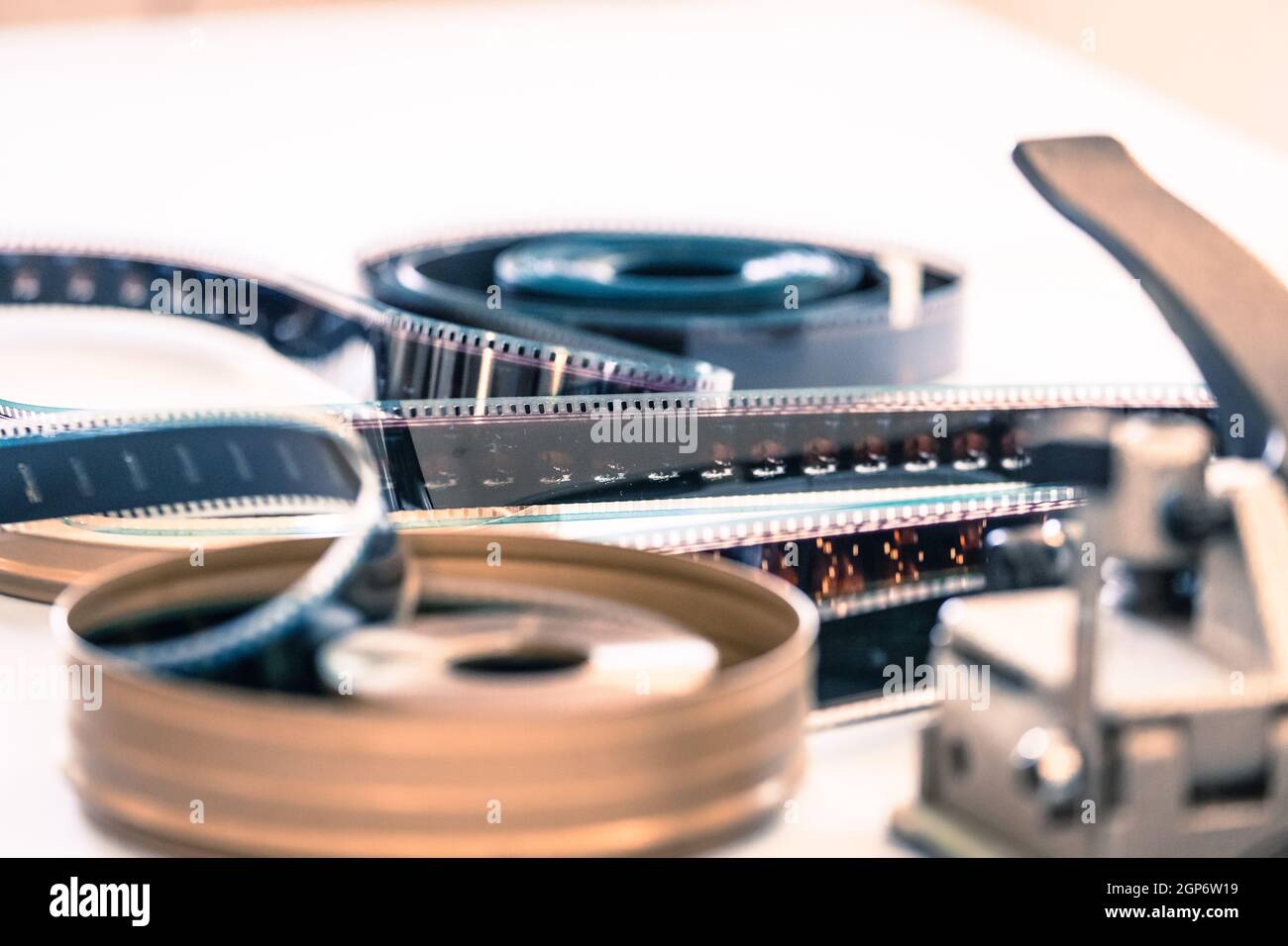 Filmstrip or film reel on a cutting table, vintage film production in ...