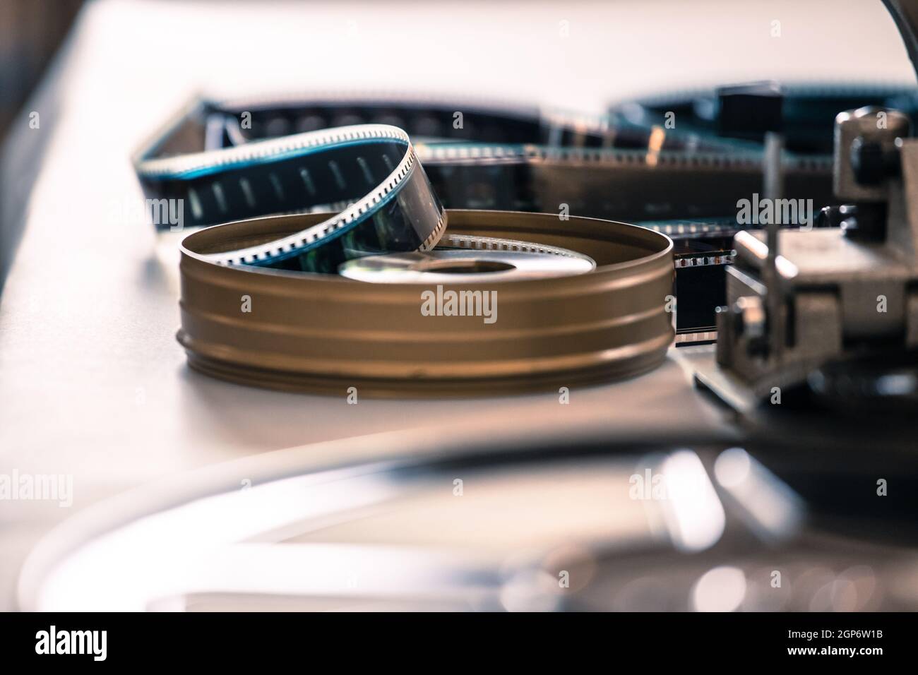 Filmstrip or film reel on a cutting table, vintage film production in ...